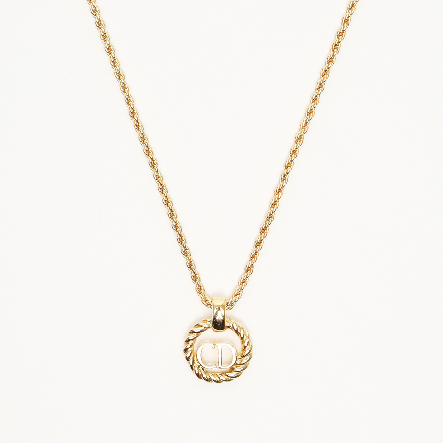 A Retro Tale - CHRISTIAN DIOR Vintage Twist Ring Logo Necklace