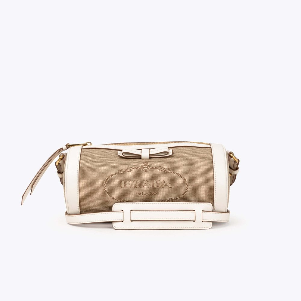 PRADA Logo Jacquard Barrel Crossbody Bag | A Retro Tale