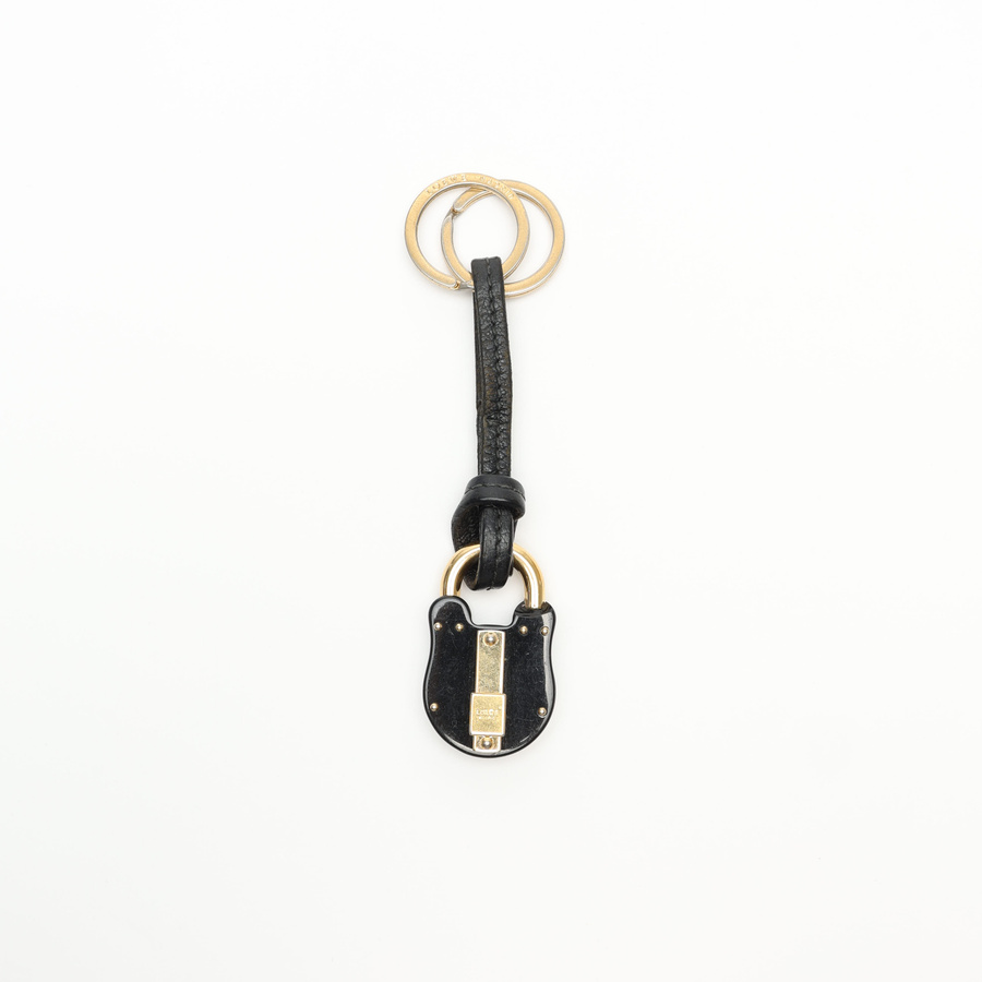 Vintage Loewe Charm Key Ring - A Retro Tale
