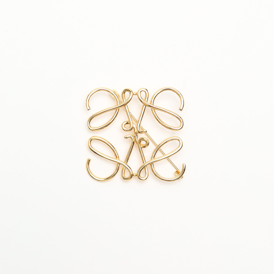 Vintage Loewe Brooch Anagram - A Retro Tale