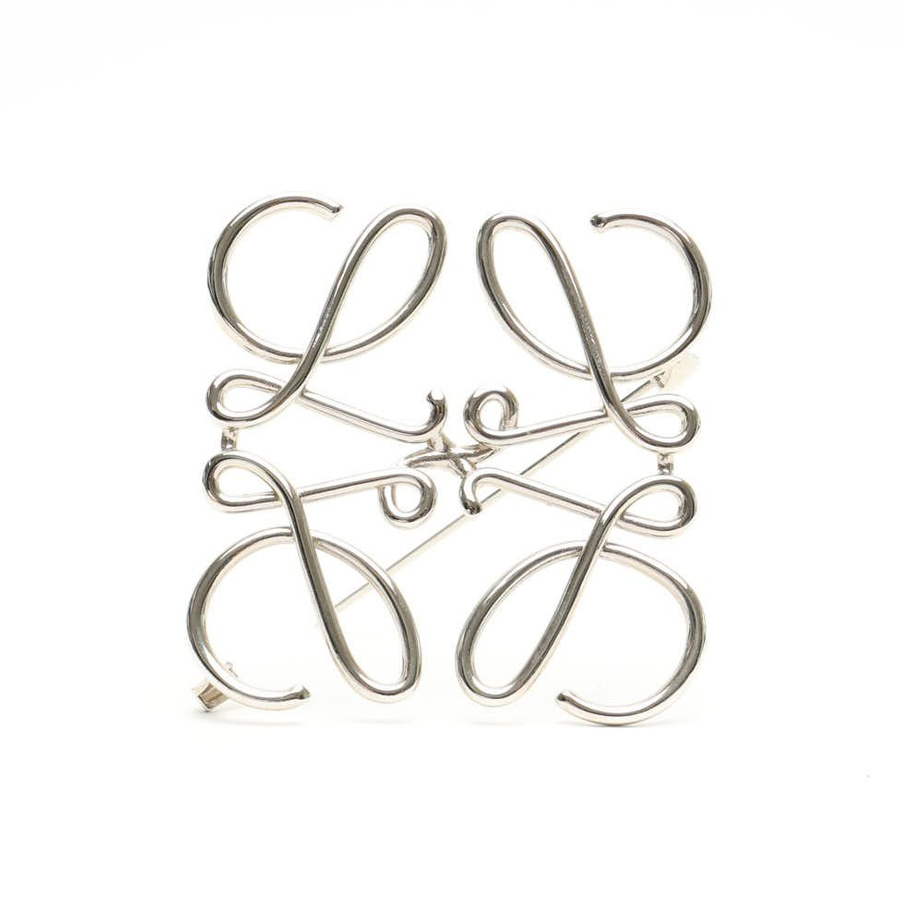 Vintage Loewe Anagram Brooch - A Retro Tale