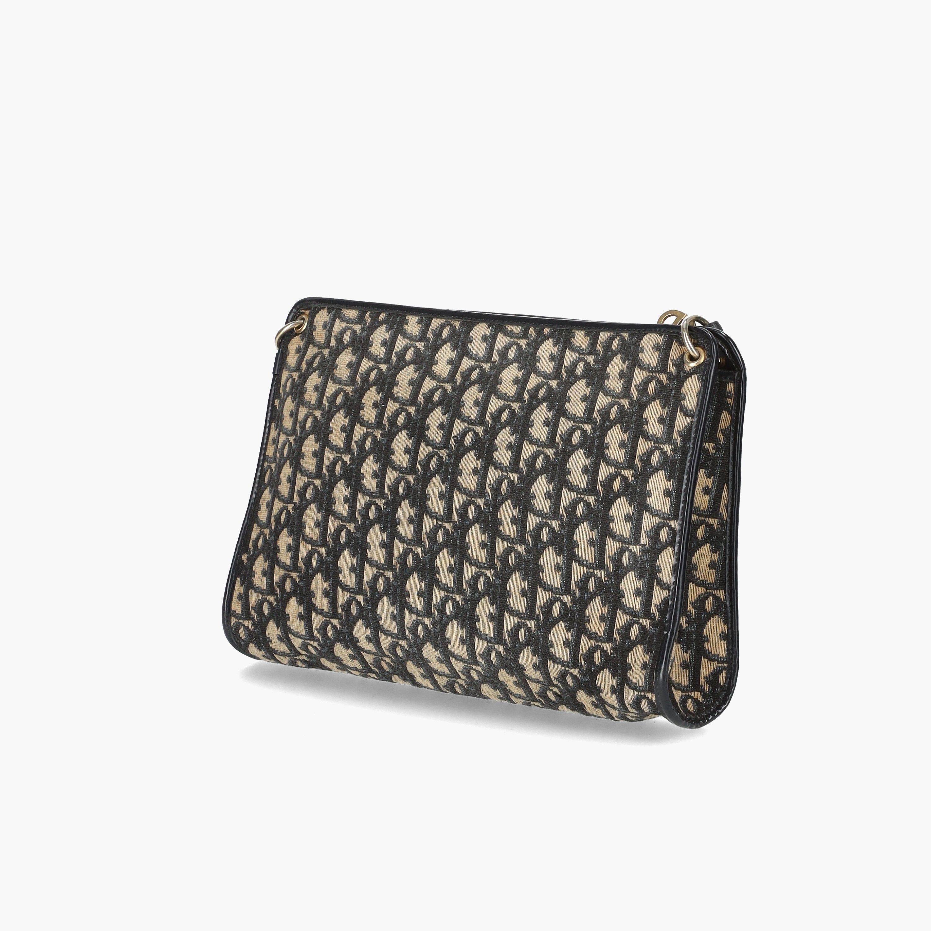 CHRISTIAN DIOR Vintage Diorissmo Clutch Bag - A Retro Tale